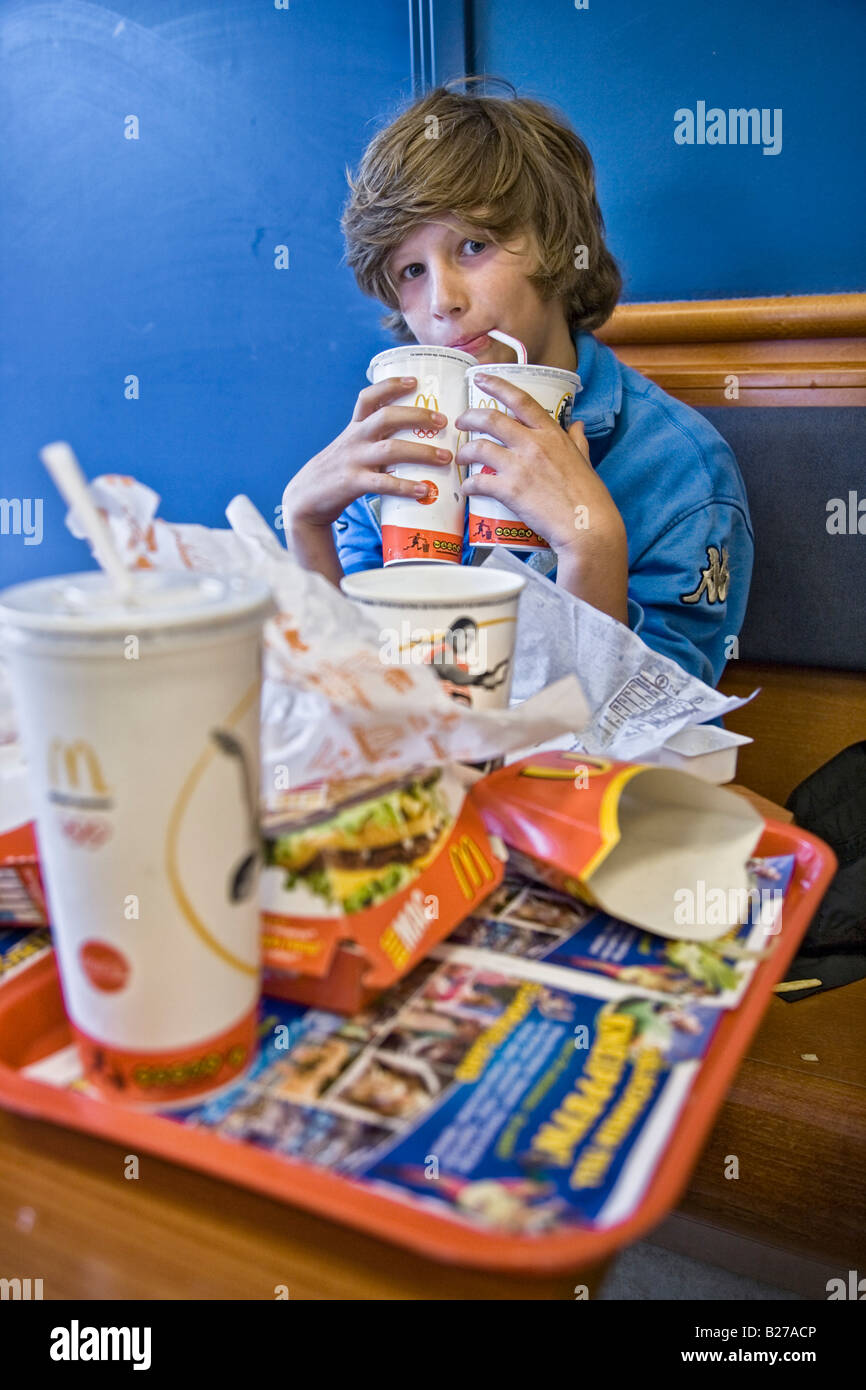 a youngster 12 years in a fast food chain restaurang Stock Photo - Alamy