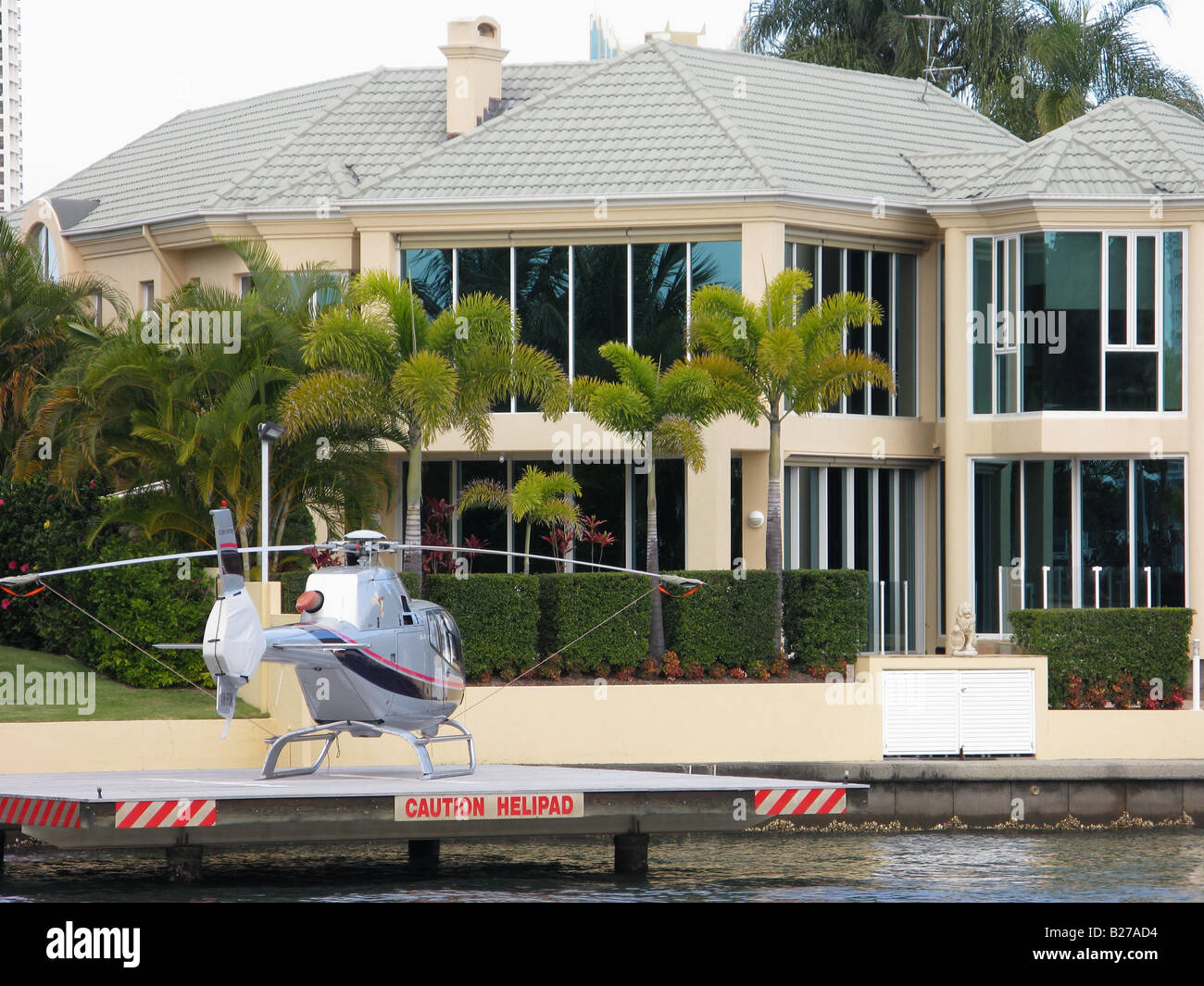 Waterfront house with helicopter parked in front, Surfers Paradise ...