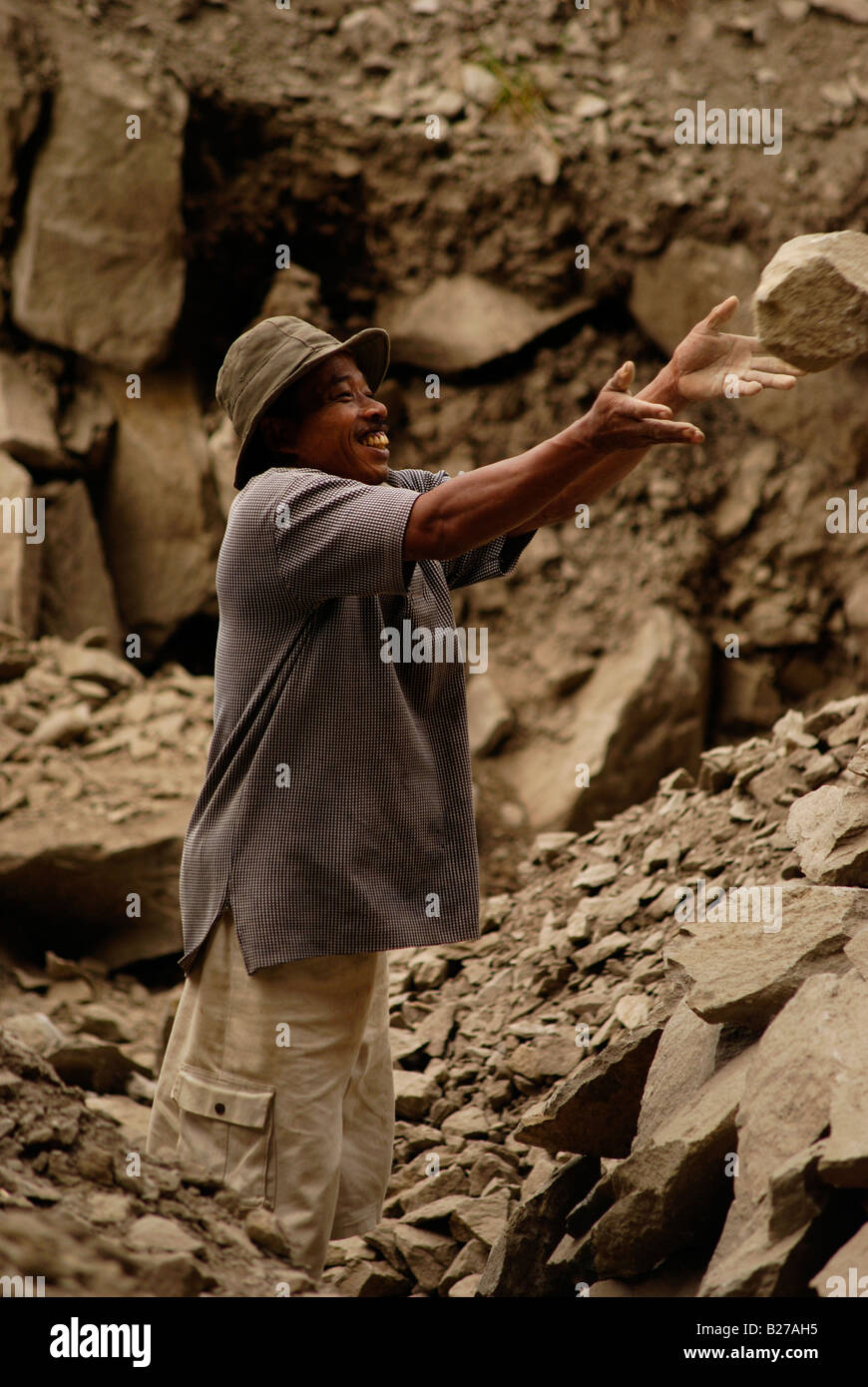 Indonesian quarry worker Stock Photo - Alamy