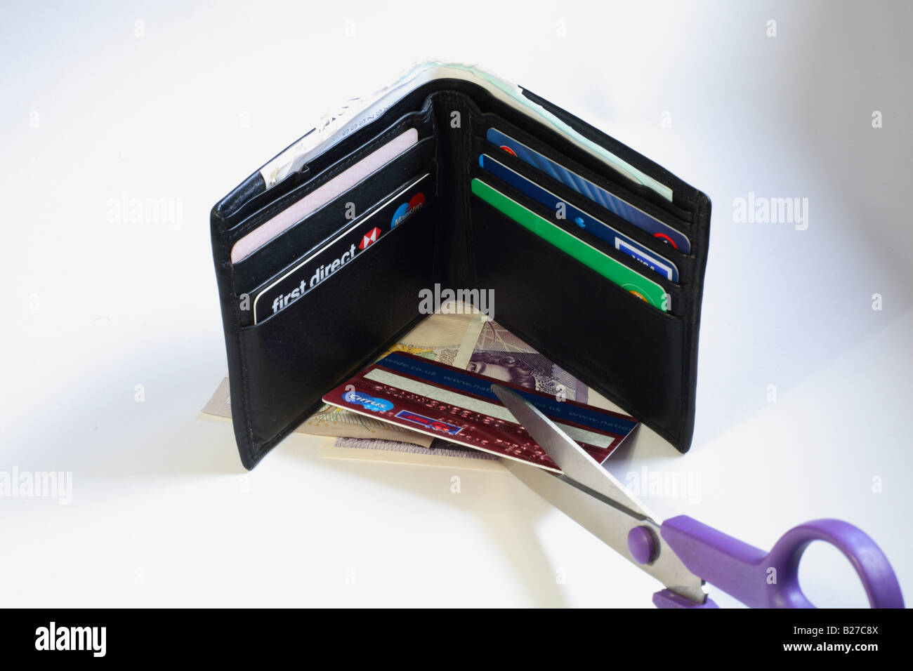 Cutting up credit cards hi-res stock photography and images - Alamy