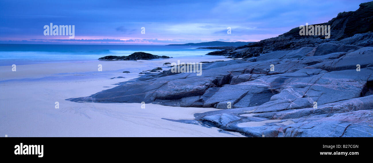 Rocks and sand on Traigh Iar beach at sunset, Horgabost, Harris ...