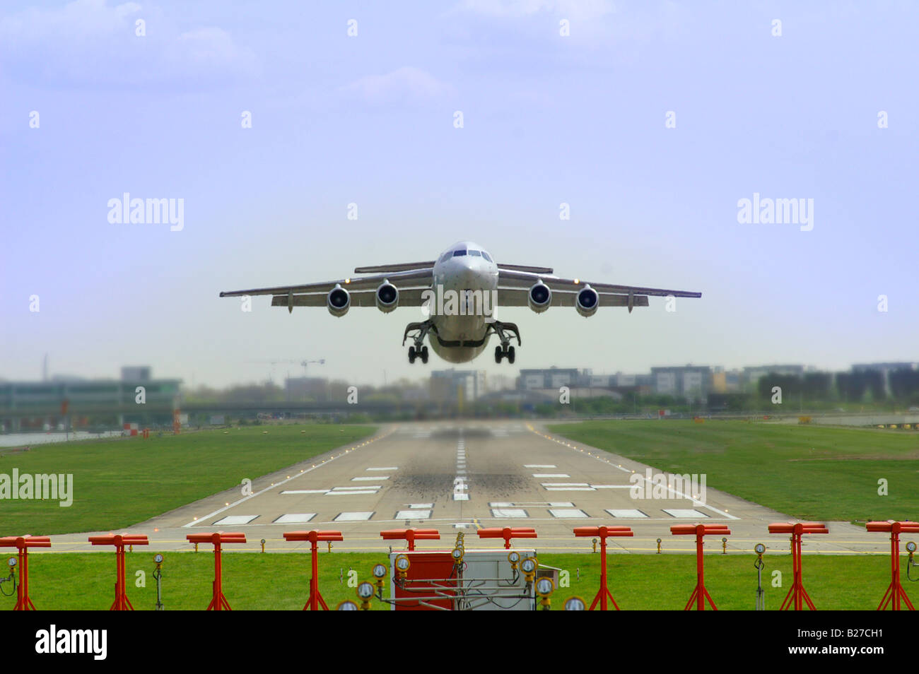 Jet plane starting from runway Stock Photo - Alamy