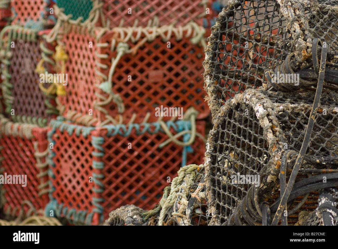 A cornish still life of multi colored lobster pots arranged on the ...