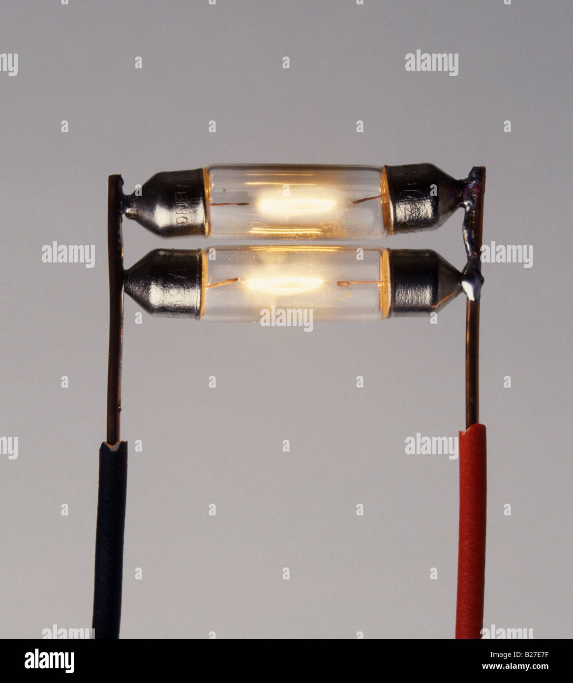 two filament lamps can be used in an experiment to investigate ...