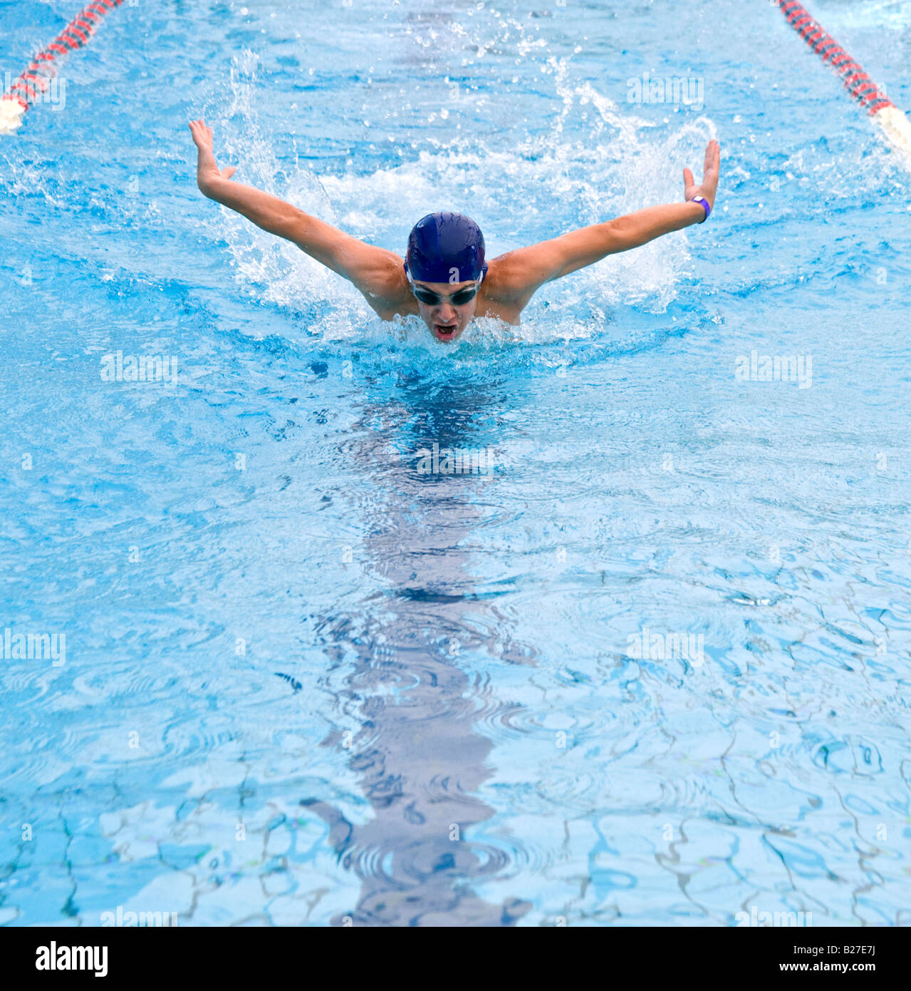 teenager swimmer in a butterfly stroke Stock Photo - Alamy