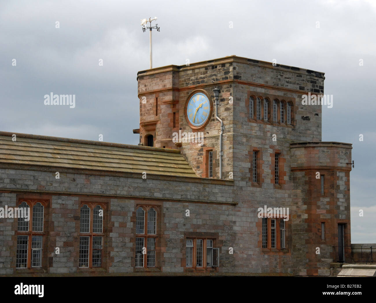 Bamburgh Castle clock tower Stock Photo - Alamy