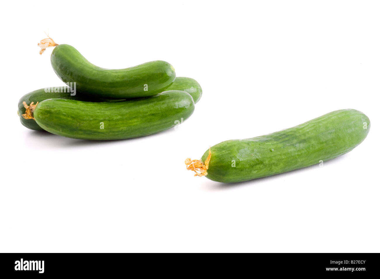 group of cucumbers isolated on white Stock Photo - Alamy