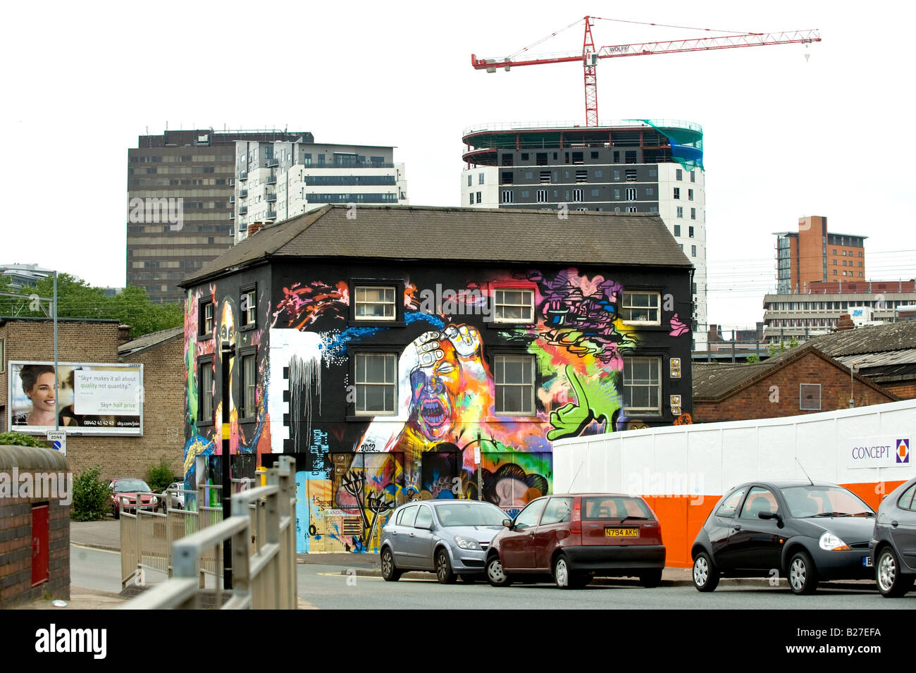 House building painted with gaudy mural in Digbeth in Birmingham Stock ...