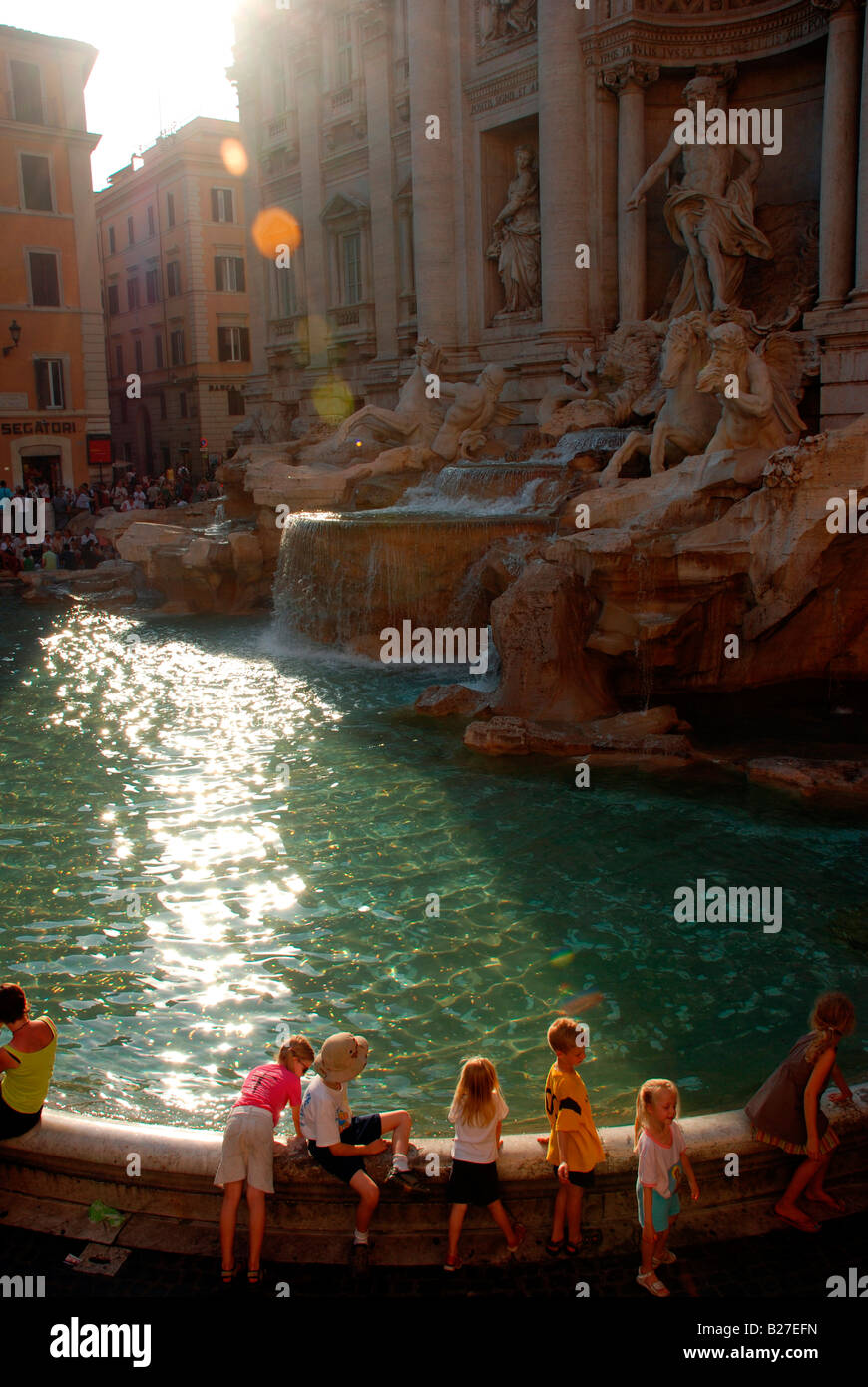 Children playing at the Trevi Fountain, Rome Stock Photo - Alamy