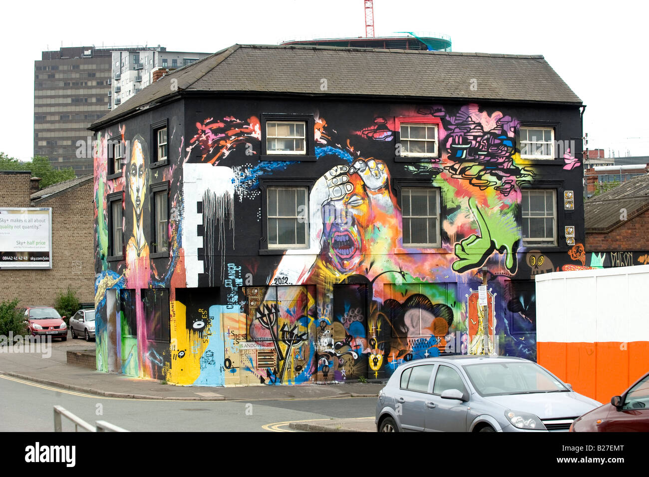 House building painted with gaudy mural in Digbeth in Birmingham Stock ...