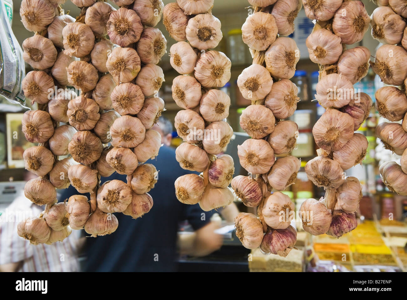 Strings of garlic in market Spain Stock Photo - Alamy