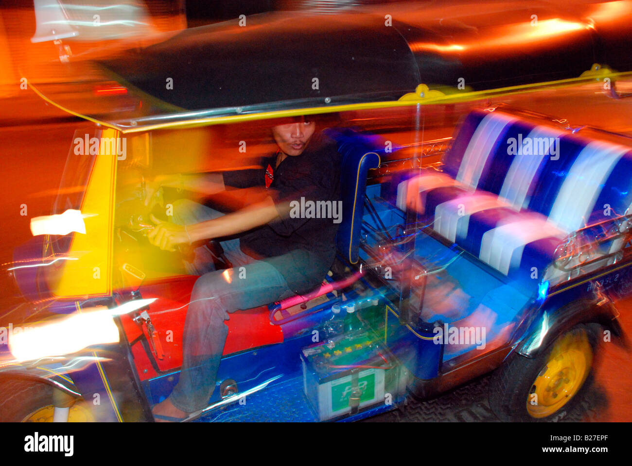 Tuk-tuk driver and his tuk-tuk speeding by Stock Photo - Alamy Tuk-tuk driver and his tuk-tuk speeding by Stock Photo - Alamy