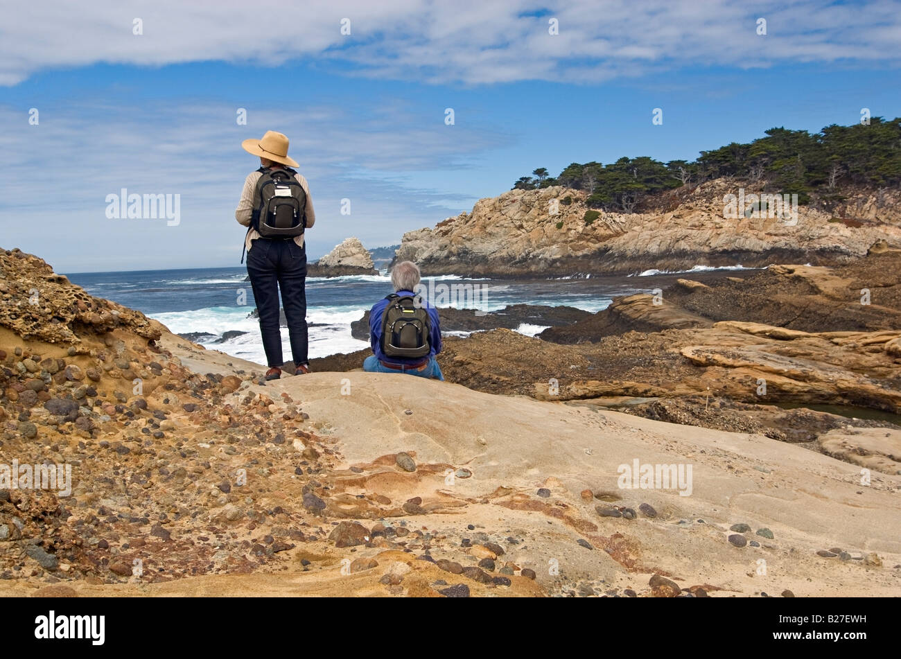 A couple enjoying the ocean scenery Stock Photo - Alamy