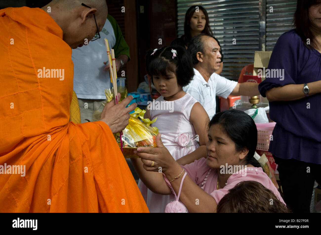 Buddhist monks blessing the people Stock Photo - Alamy