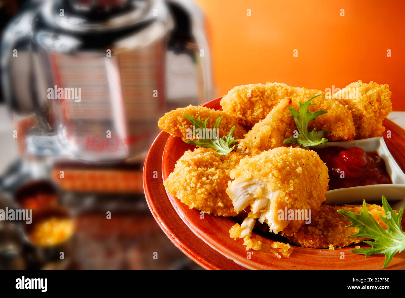 breaded chicken in an american diner setting Stock Photo - Alamy