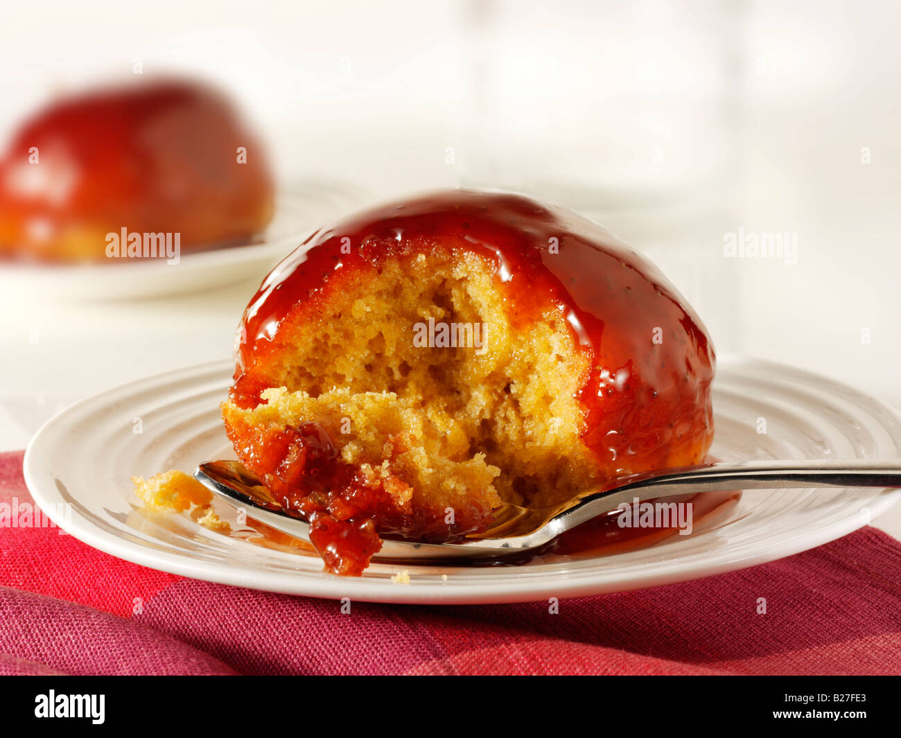 Steamed raspberry sponge and custard Stock Photo - Alamy