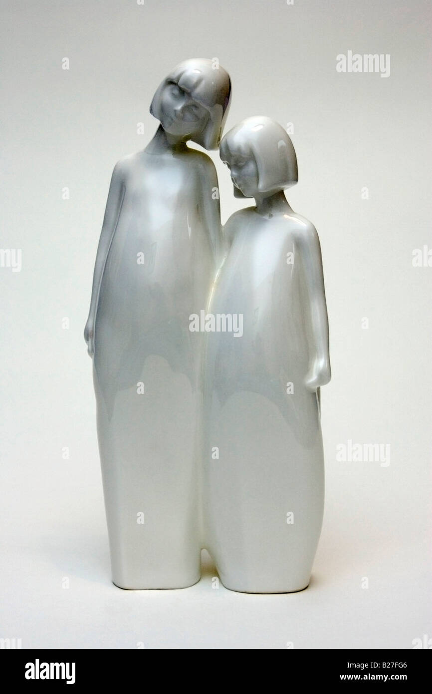 figurine of two sisters woman Stock Photo - Alamy