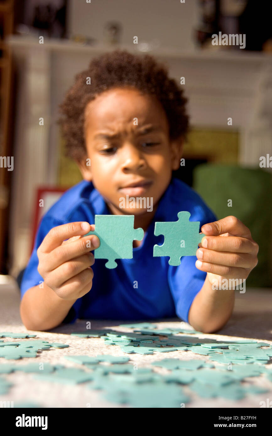 African american child puzzle hi-res stock photography and images - Alamy