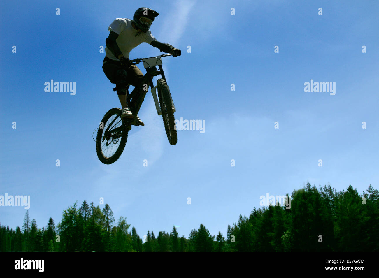 Boy doing stunt on bicycle hi-res stock photography and images - Alamy