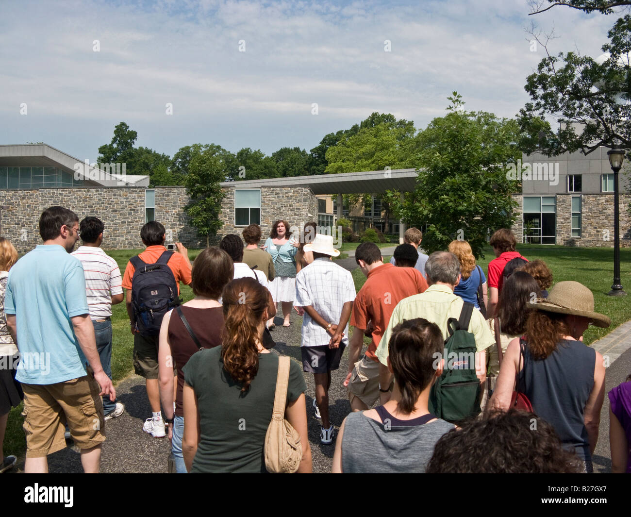 parents and prospective students on student-led admissions office tour ...