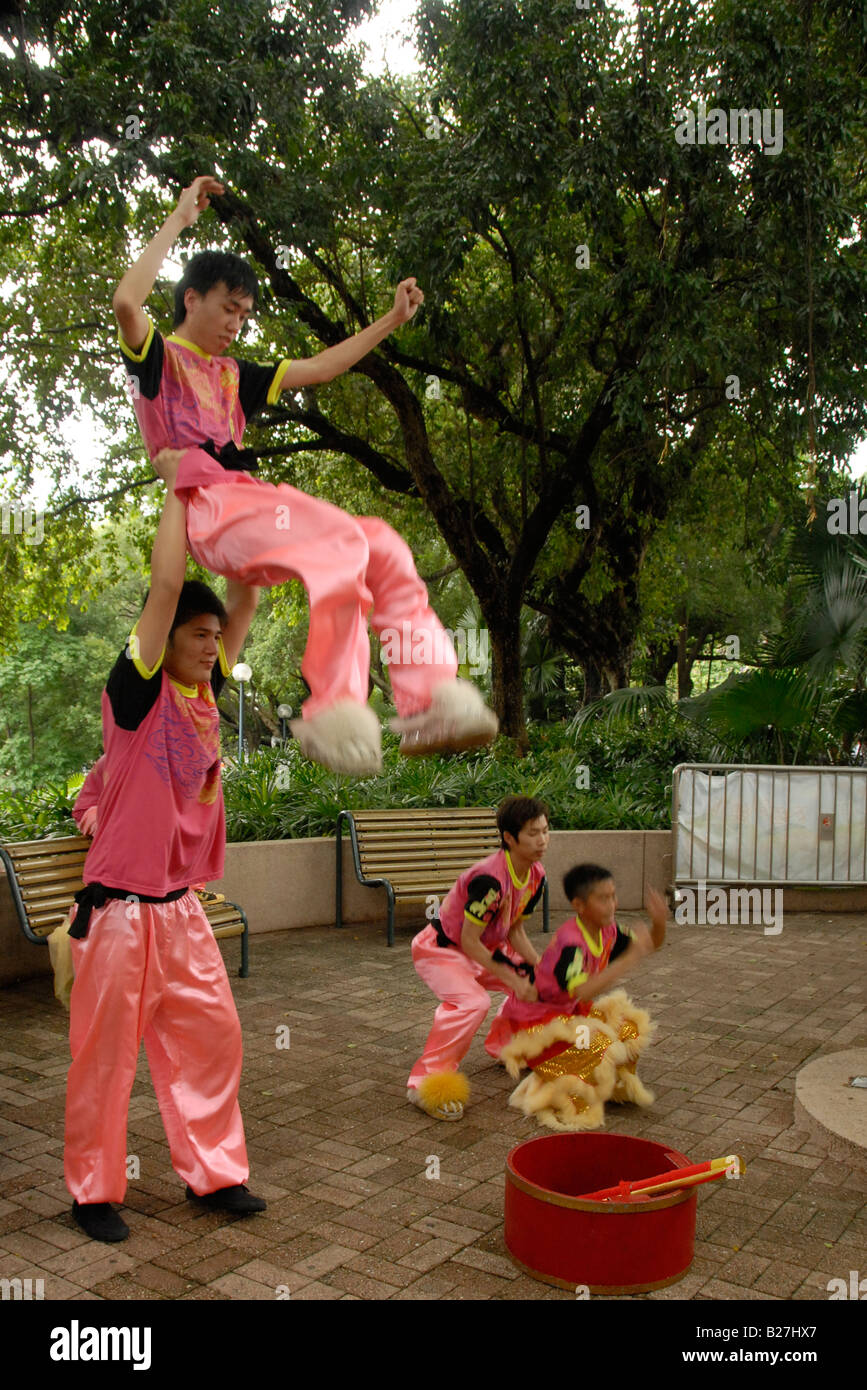 young martial art students practising lion dance, kowloon park kowloon ...