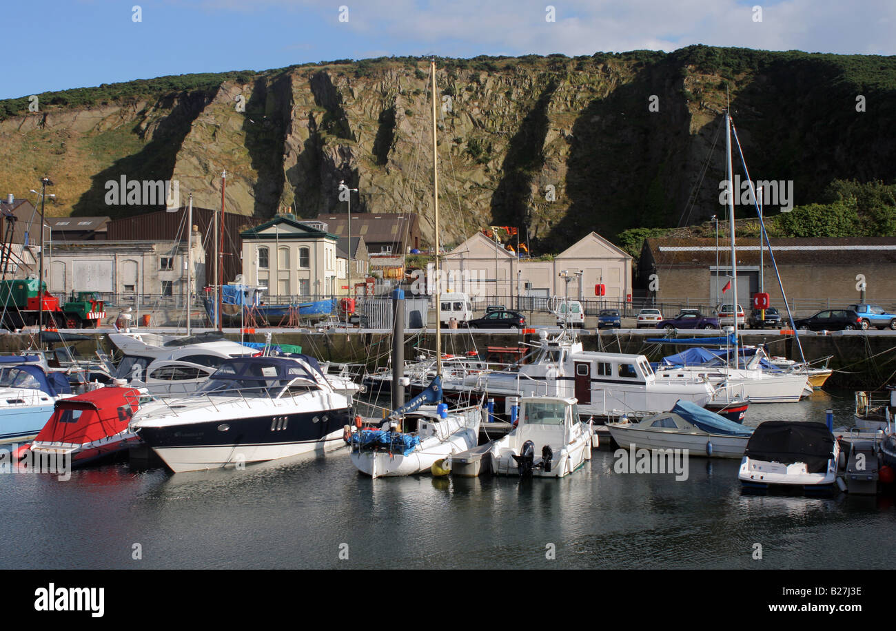 View of the Douglas marina with cliffs in the distance, Isle of Man ...