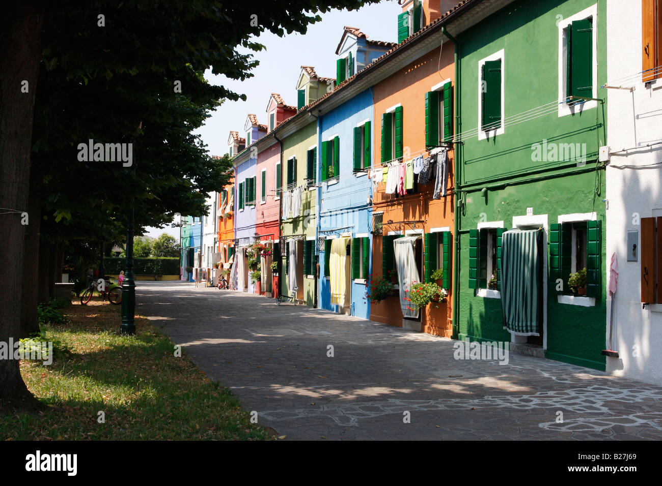 Row of colourful painted houses hi-res stock photography and images - Alamy