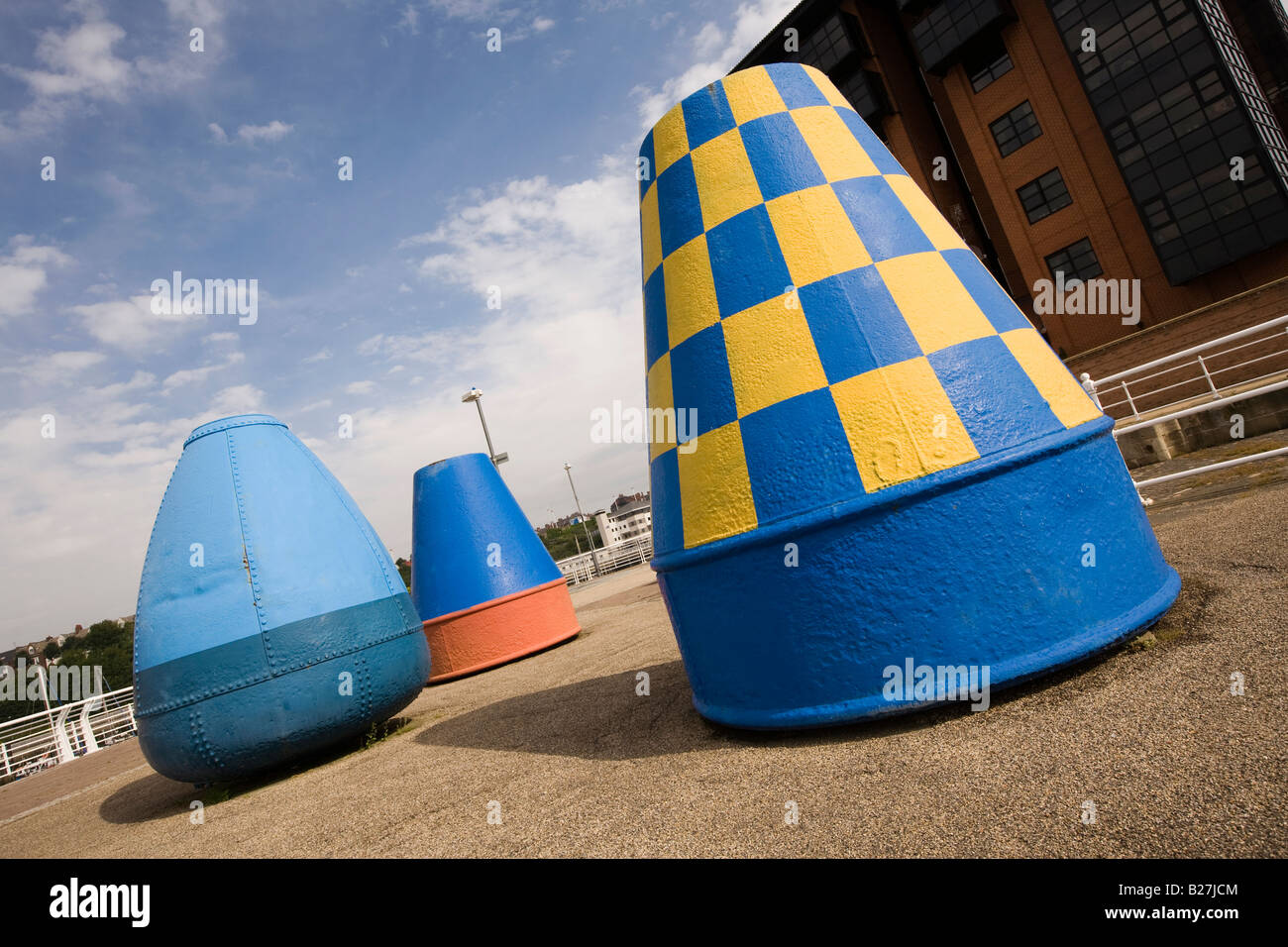 UK Tyne and Wear Sunderland Roker Marina colourful old shipping buoys ...