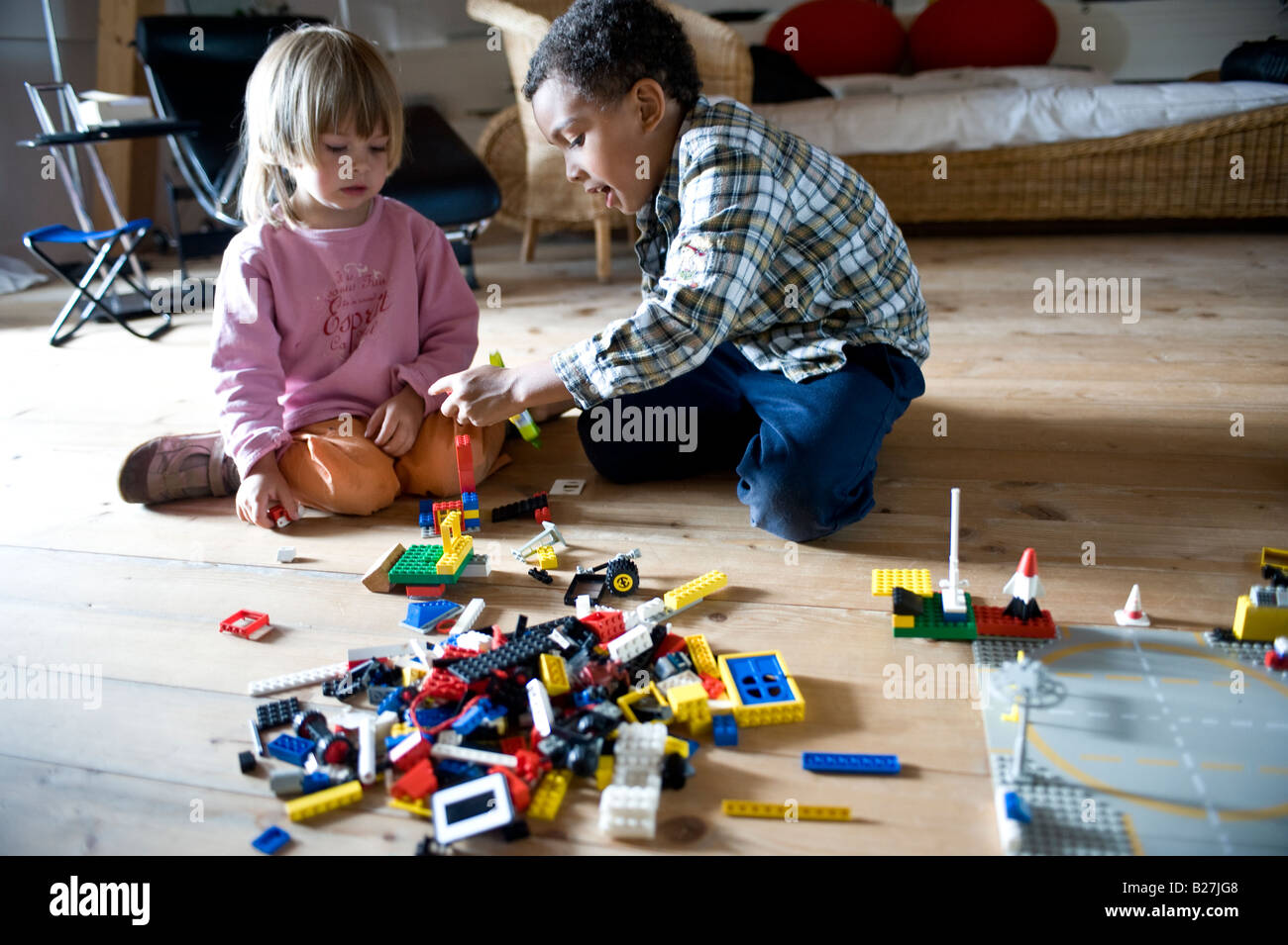 Two kids playing with lego hi-res stock photography and images - Alamy