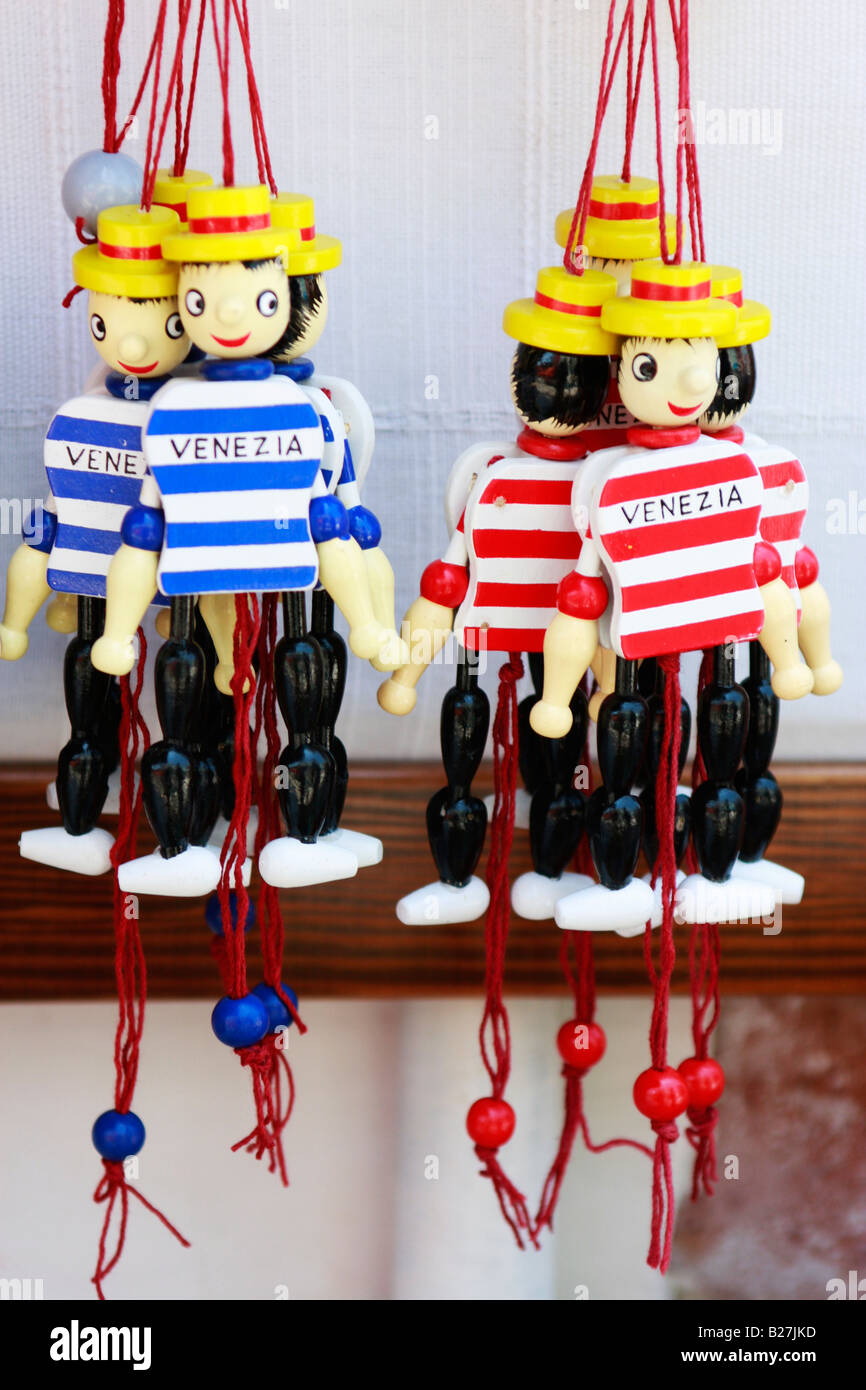 Venetian puppet gondoliers make bright souvenirs on the island of ...