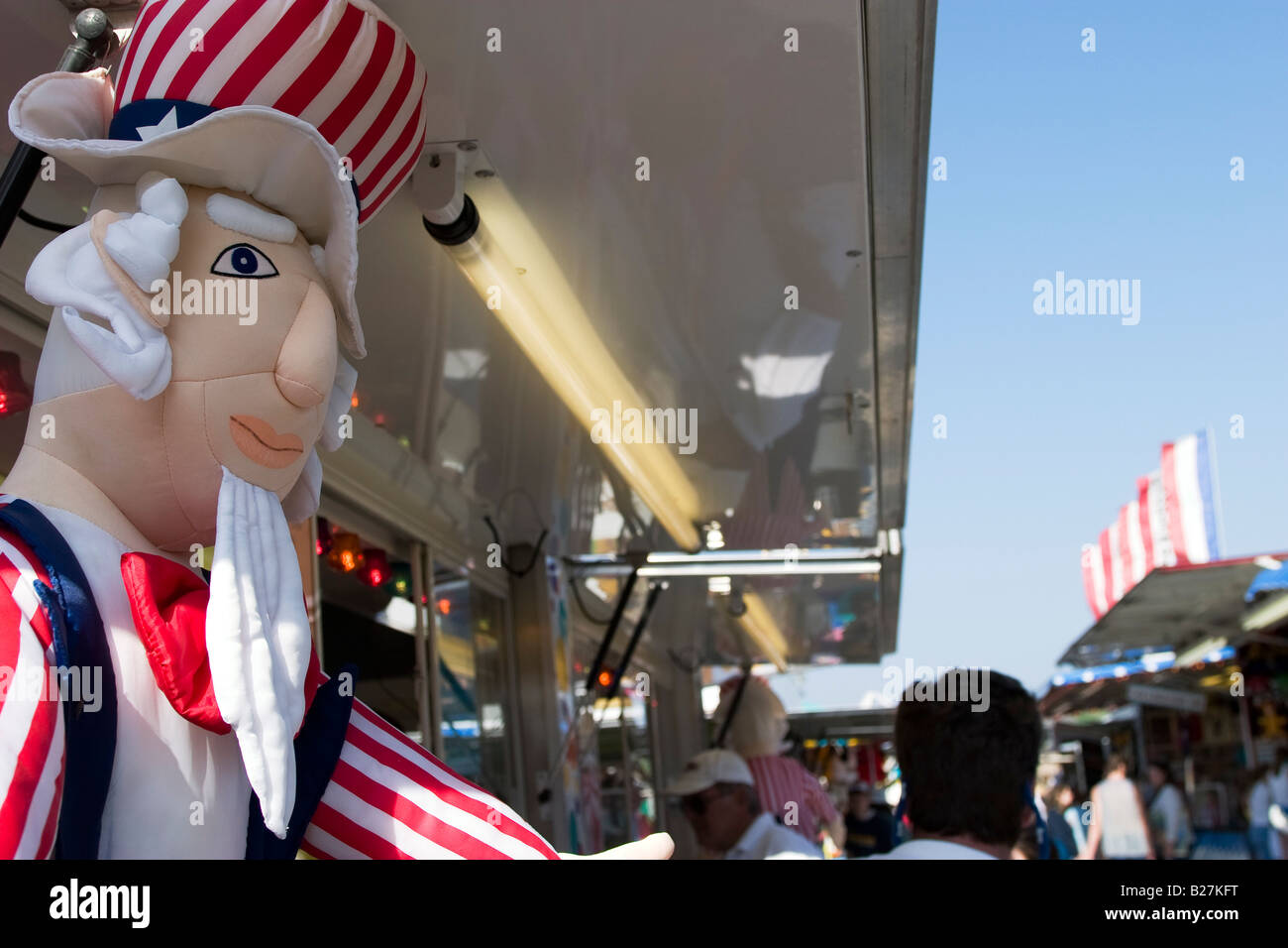 A patriotic inflatable uncle Sam on display at a seaside summer ...