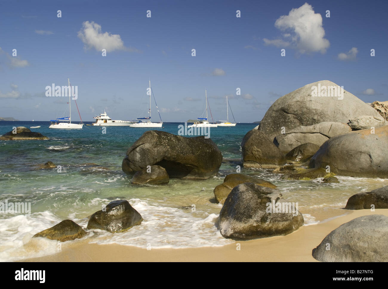 Sailboats offshore at The Baths beach on Virgin Gorda Stock Photo - Alamy