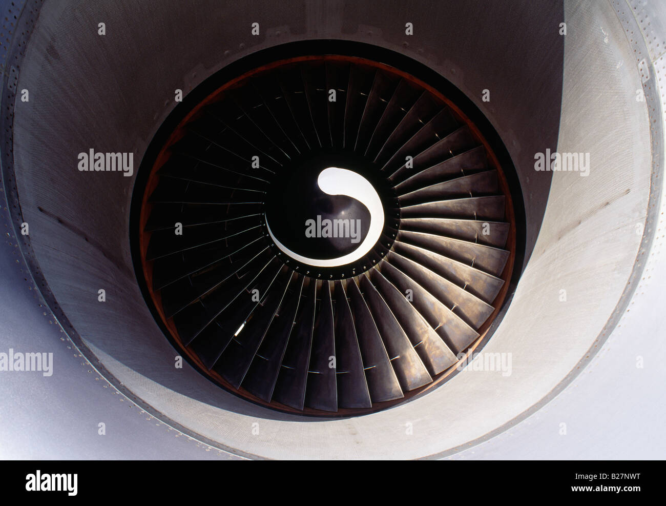 Graphic close up of the intake turbine blades of a commercial jet ...