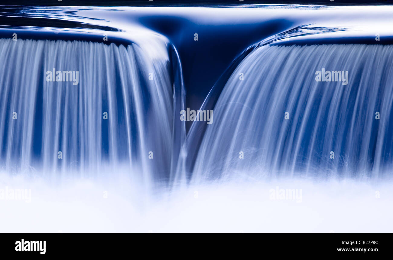 A high contrast abstract image of the vortex created by a waterfall in ...
