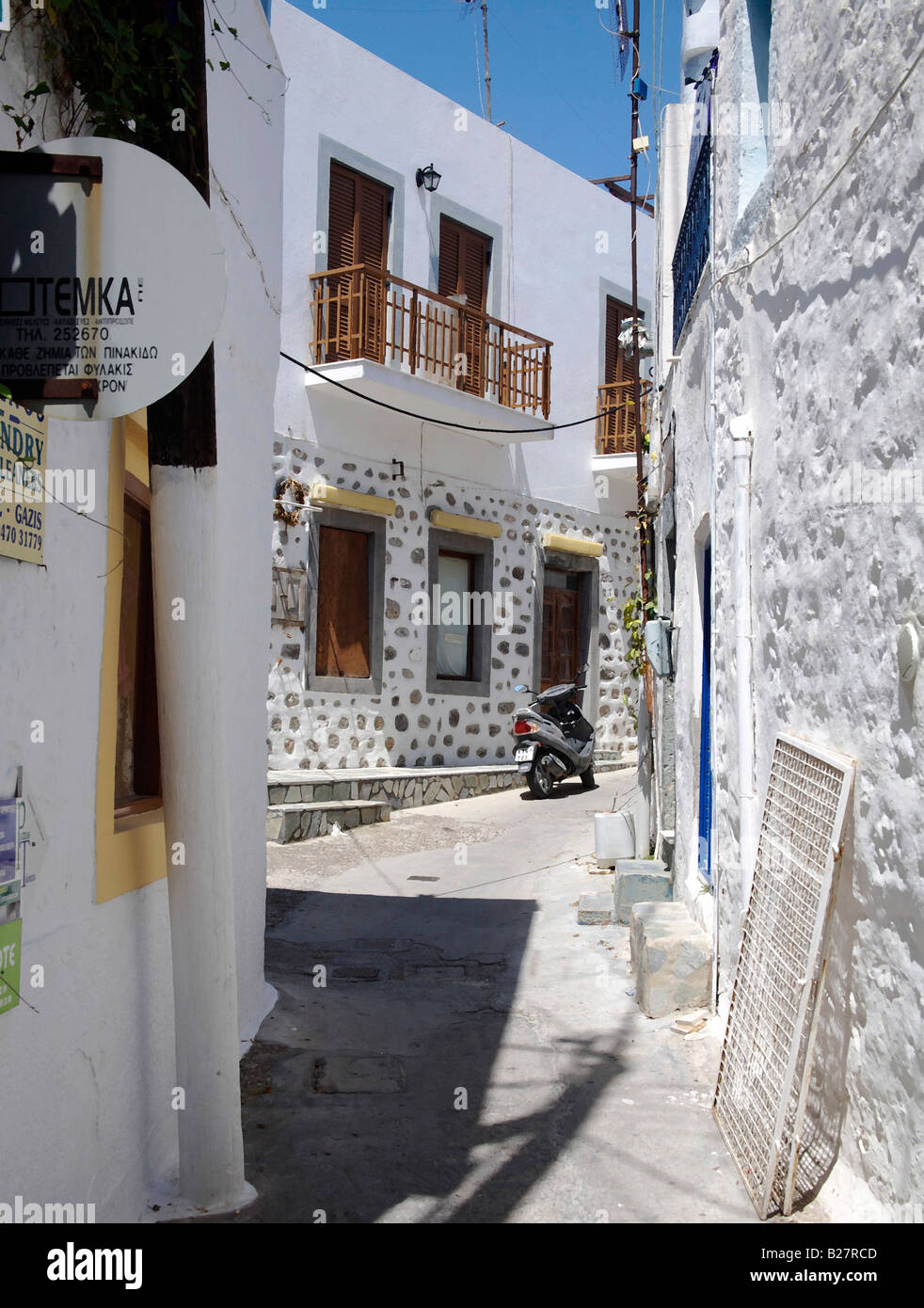 narrow street in a rustic greek island Stock Photo - Alamy