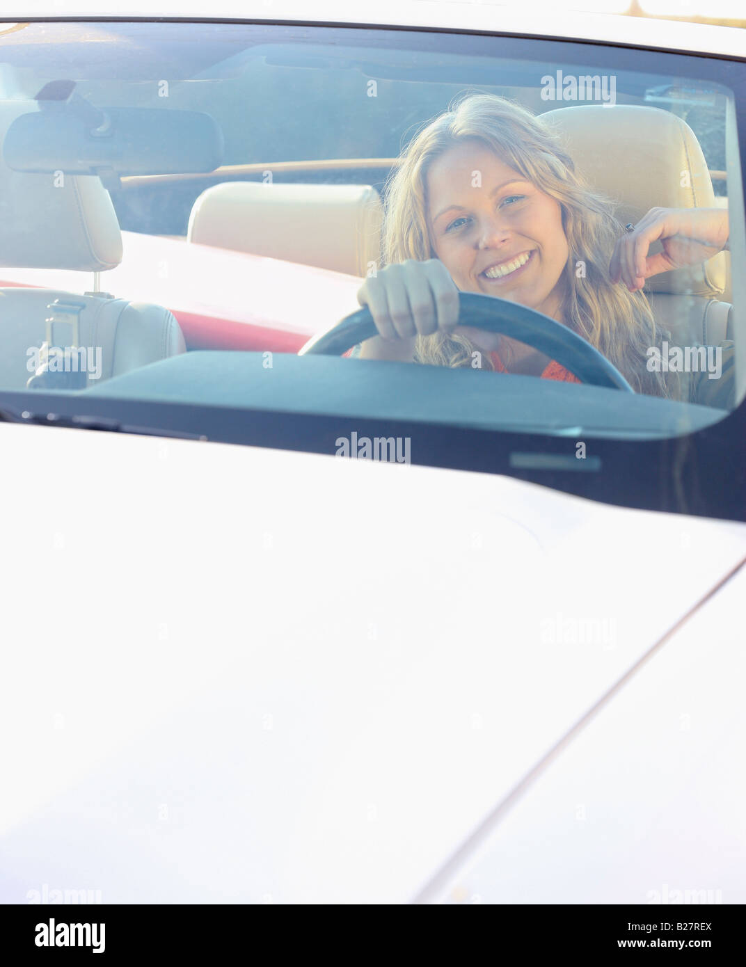 Woman driving car Stock Photo - Alamy