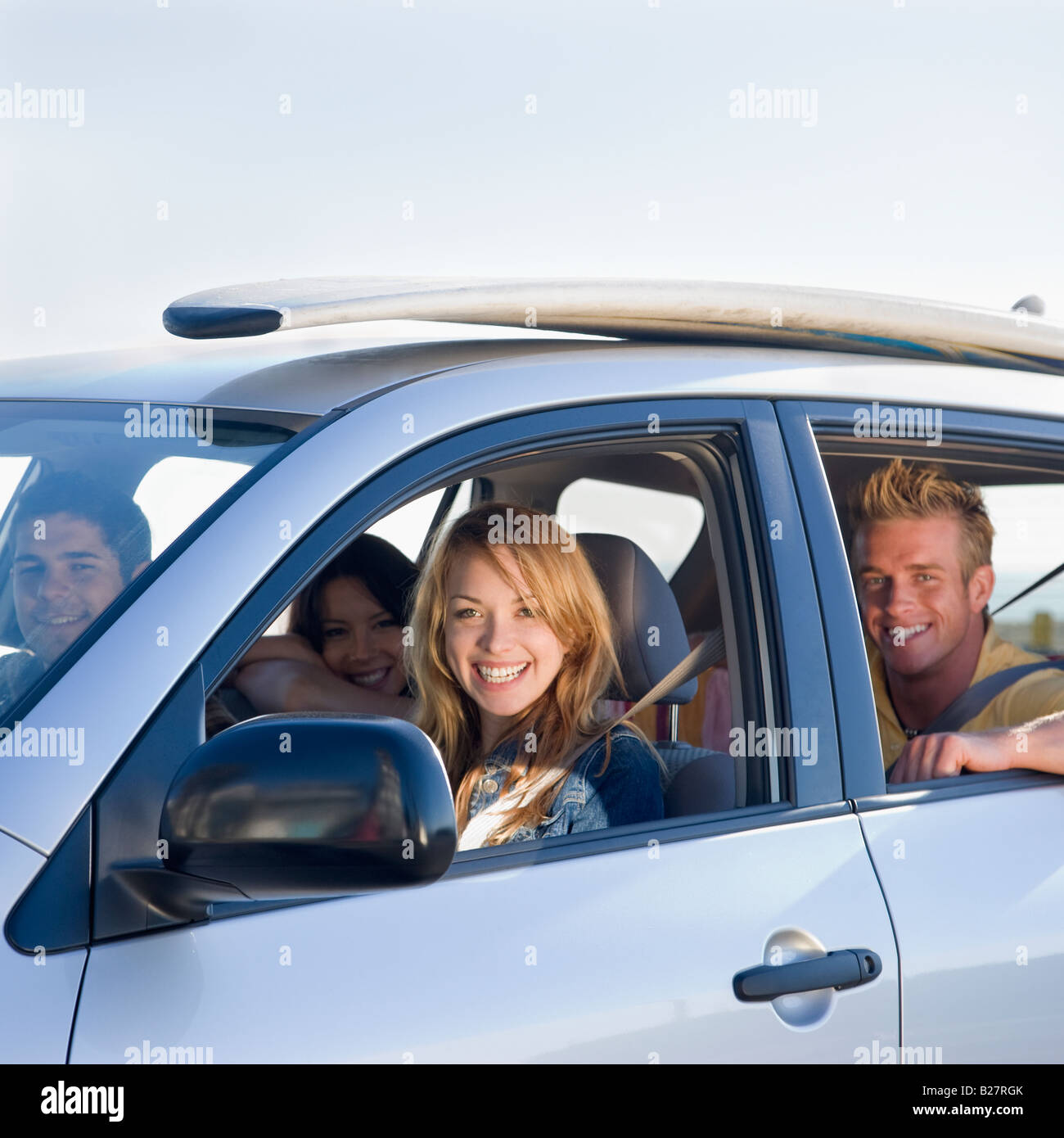 Friends driving in car Stock Photo - Alamy