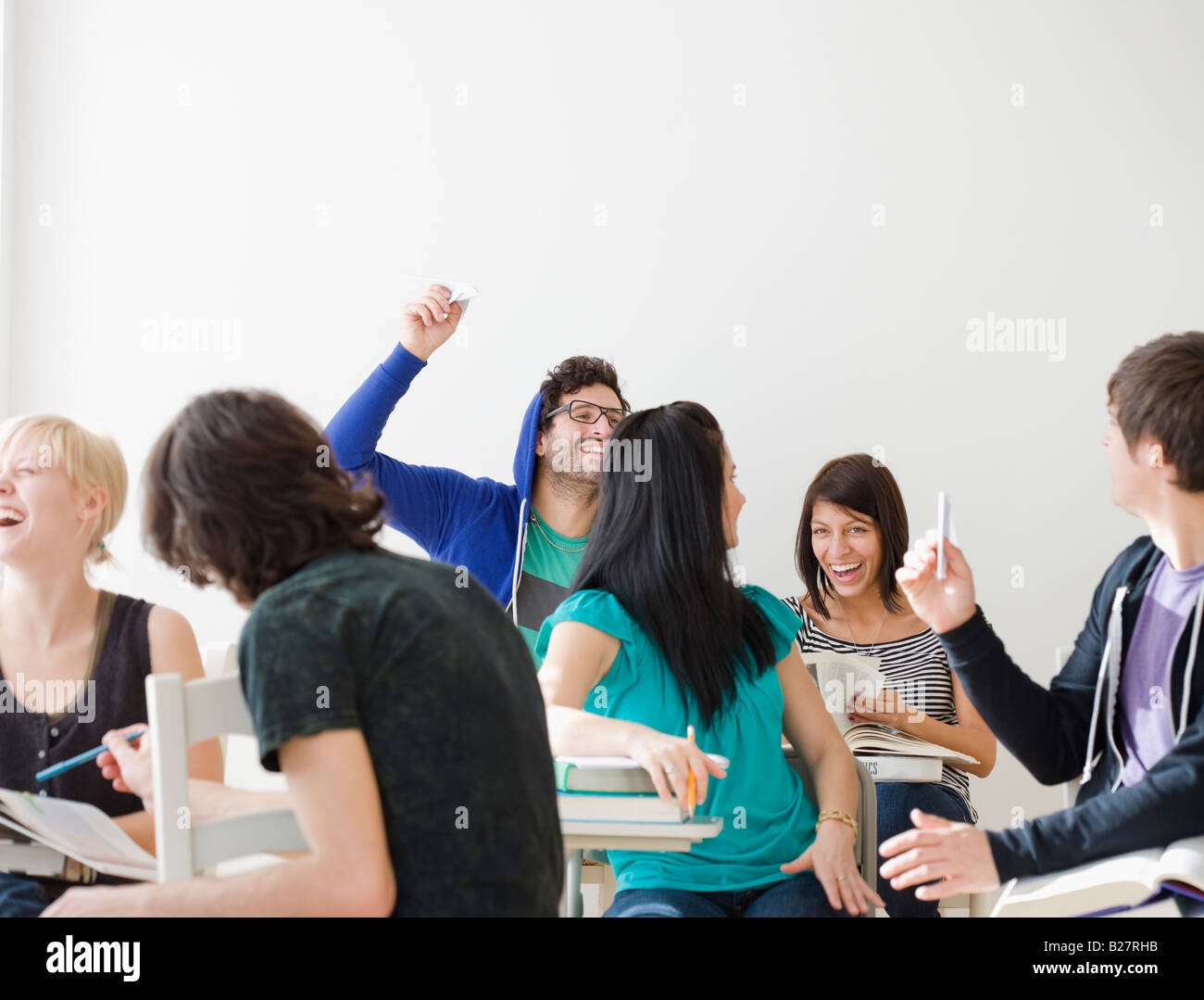 Students paper airplane classroom hi-res stock photography and images ...