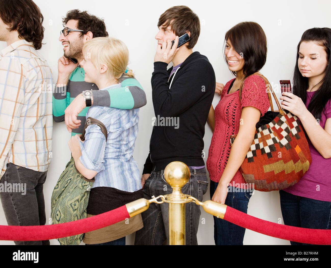 group of people waiting in line Stock Photo - Alamy