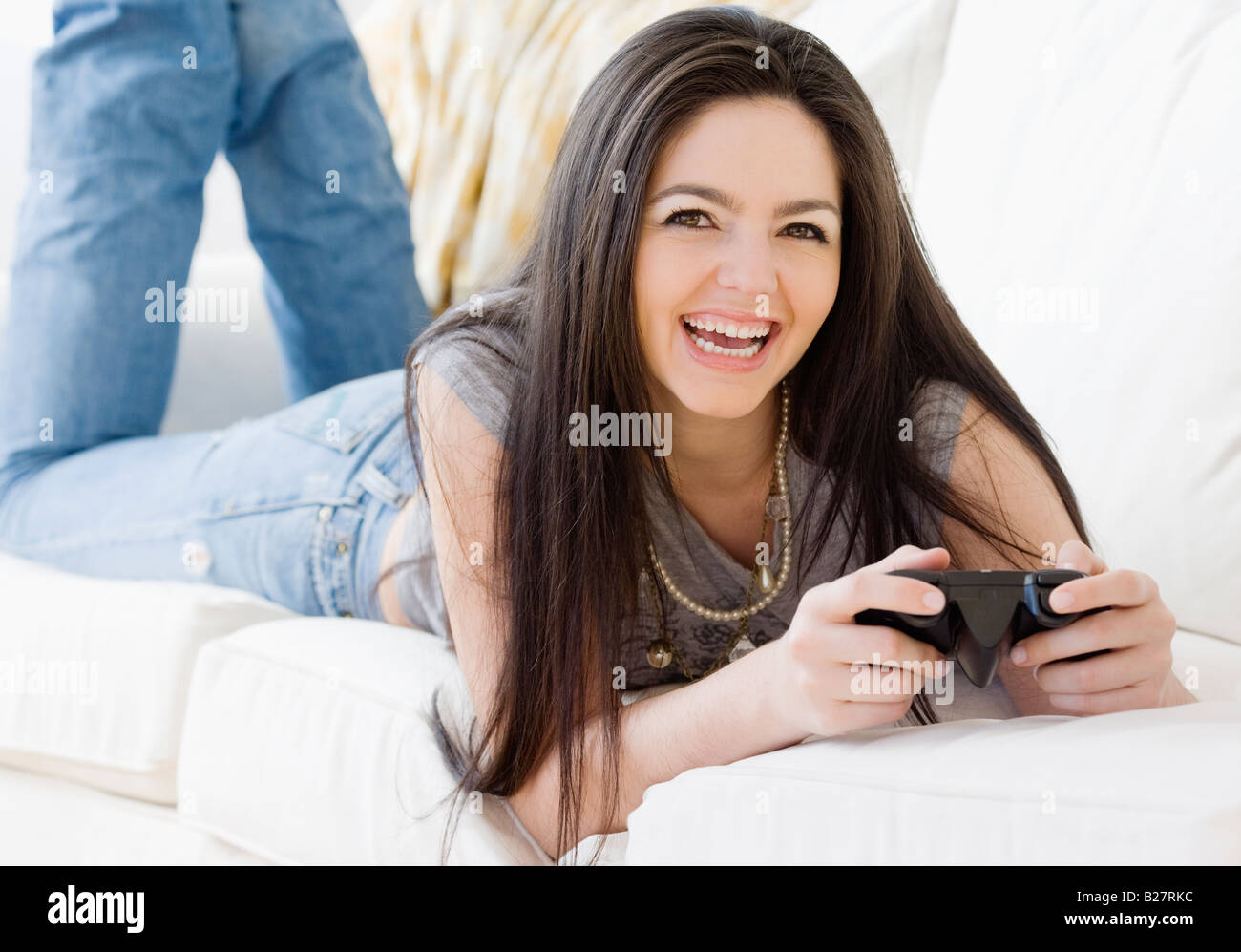Woman playing videogame Stock Photo - Alamy