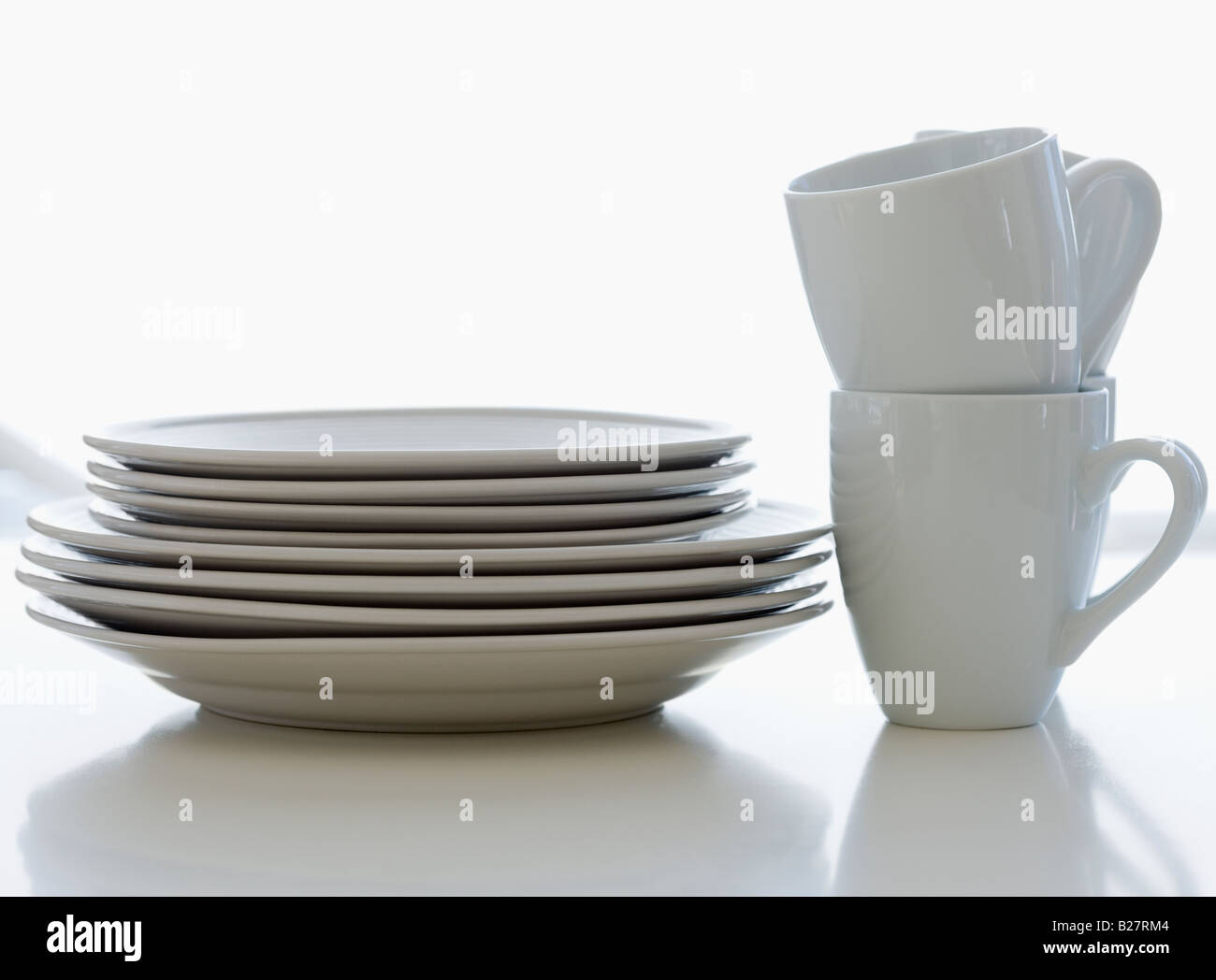 Stacks of plates and cups Stock Photo - Alamy
