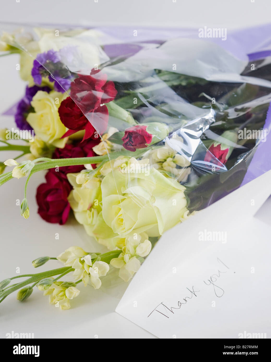 Close up of flower bouquet and note Stock Photo - Alamy