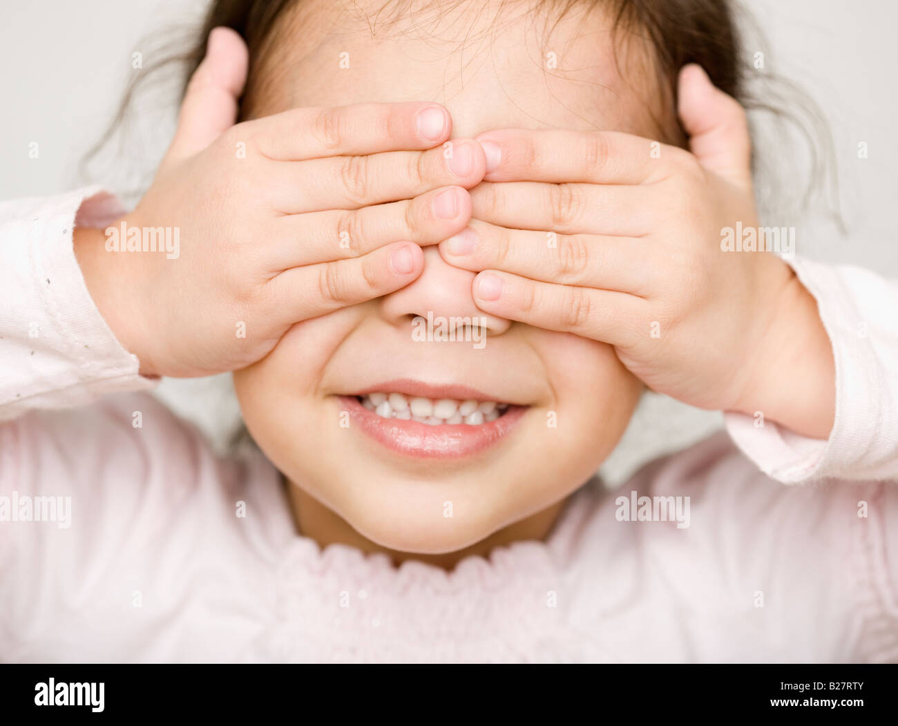 Latin female covering one eye hi-res stock photography and images - Alamy
