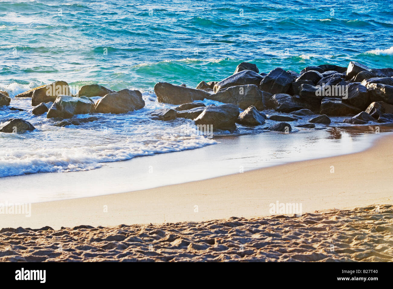 Rocks in water beach hi-res stock photography and images - Alamy