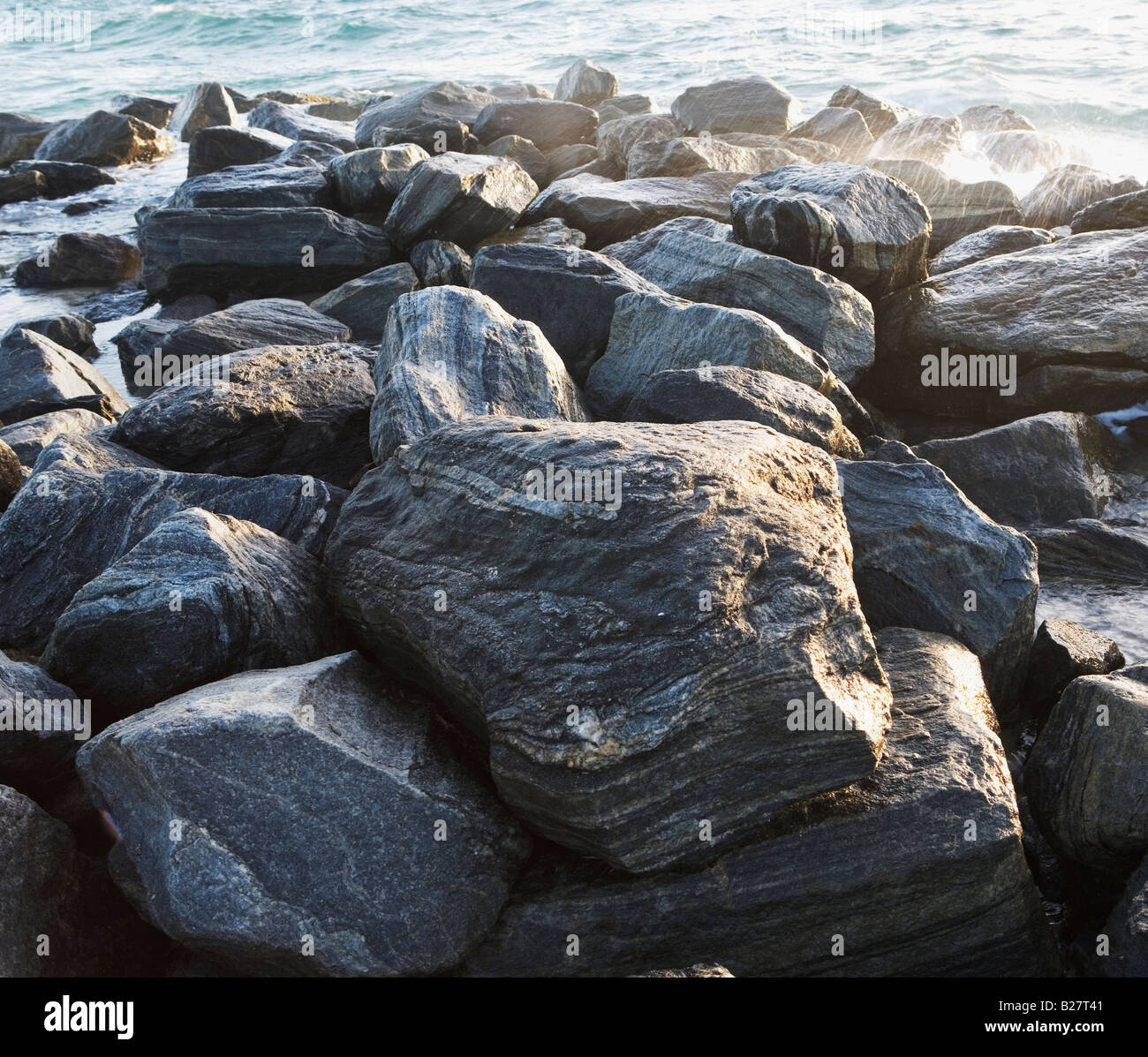 Rocks in front of water Stock Photo - Alamy