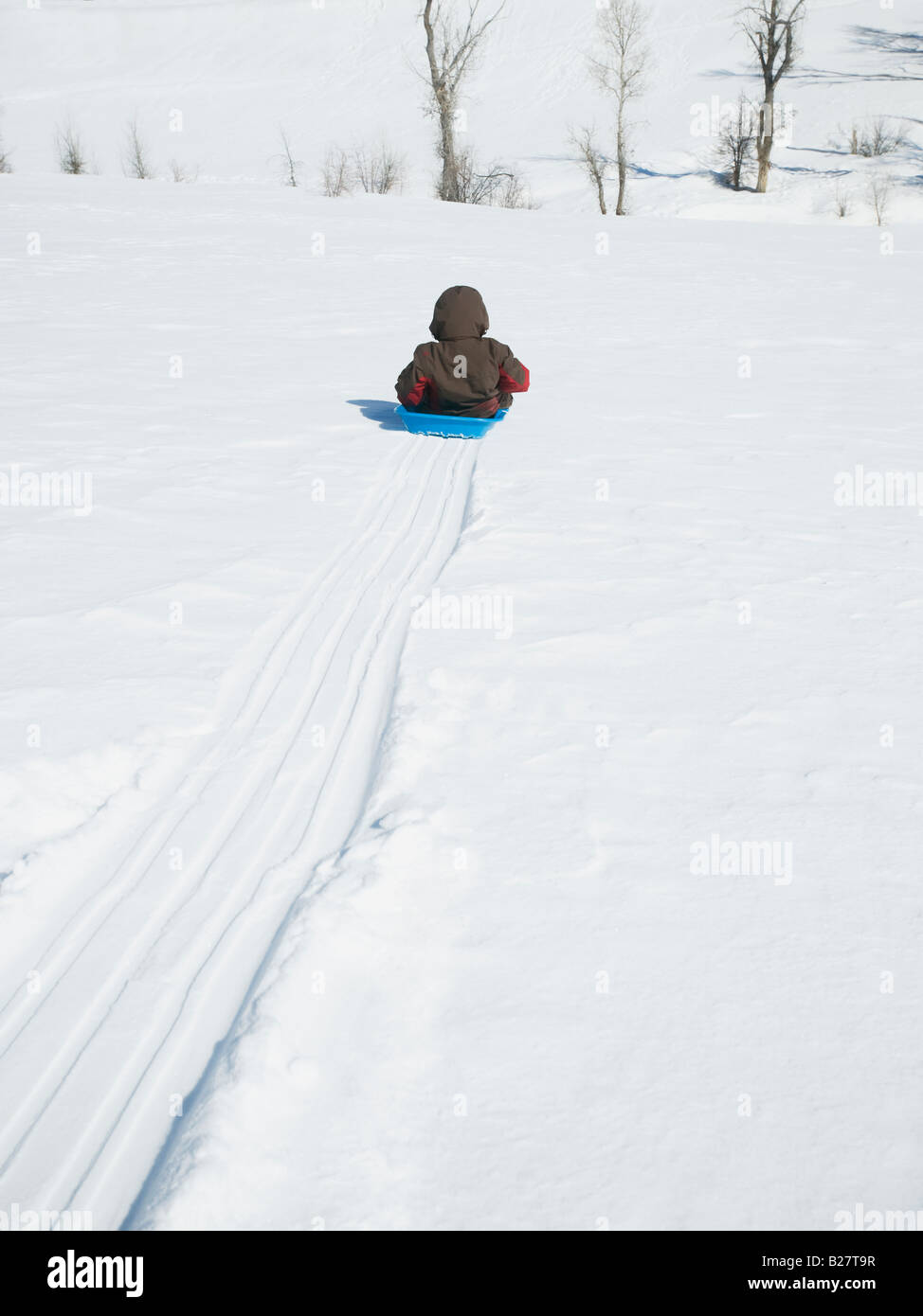 Person on sled hi-res stock photography and images - Alamy