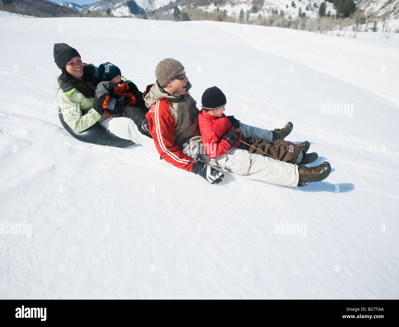 Boy riding tubing winter hi-res stock photography and images - Alamy