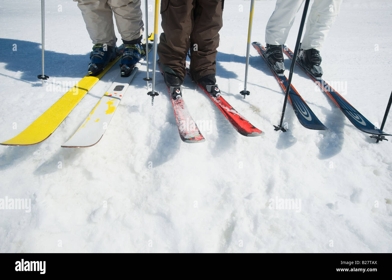 View of three people downhill skiing hi-res stock photography and ...