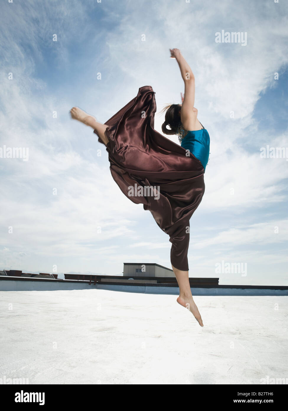 Female ballet dancer jumping Stock Photo - Alamy