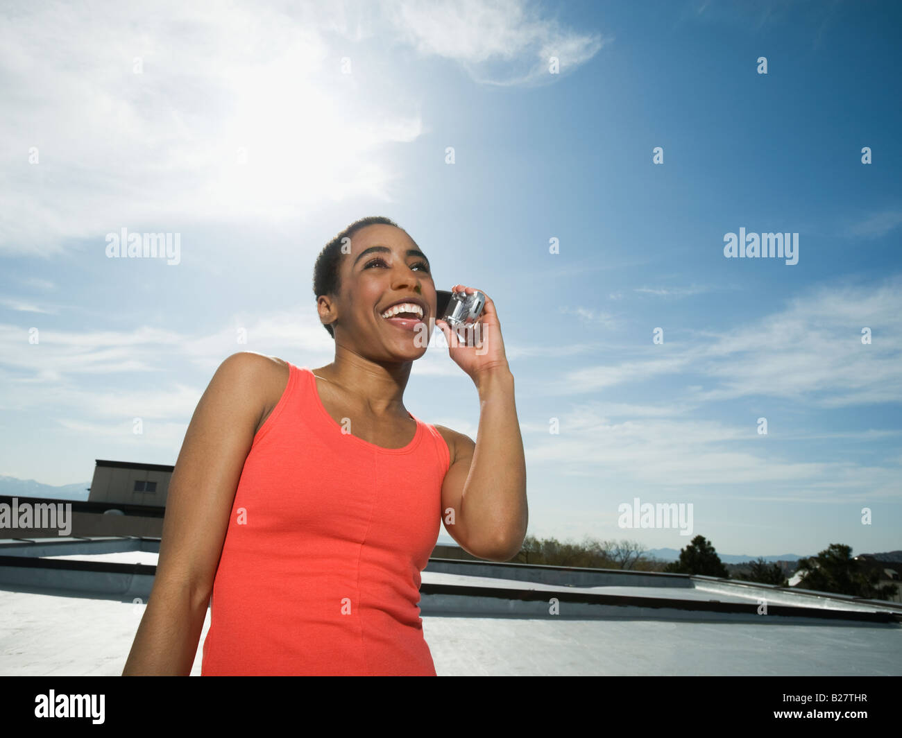 African woman talking on cell phone Stock Photo - Alamy